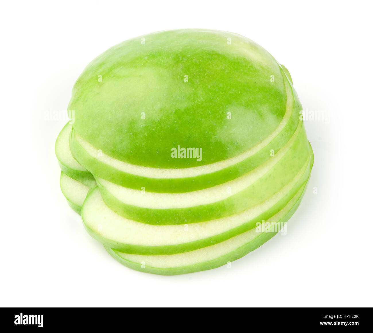 sliced green apple isolated on a white background Stock Photo - Alamy