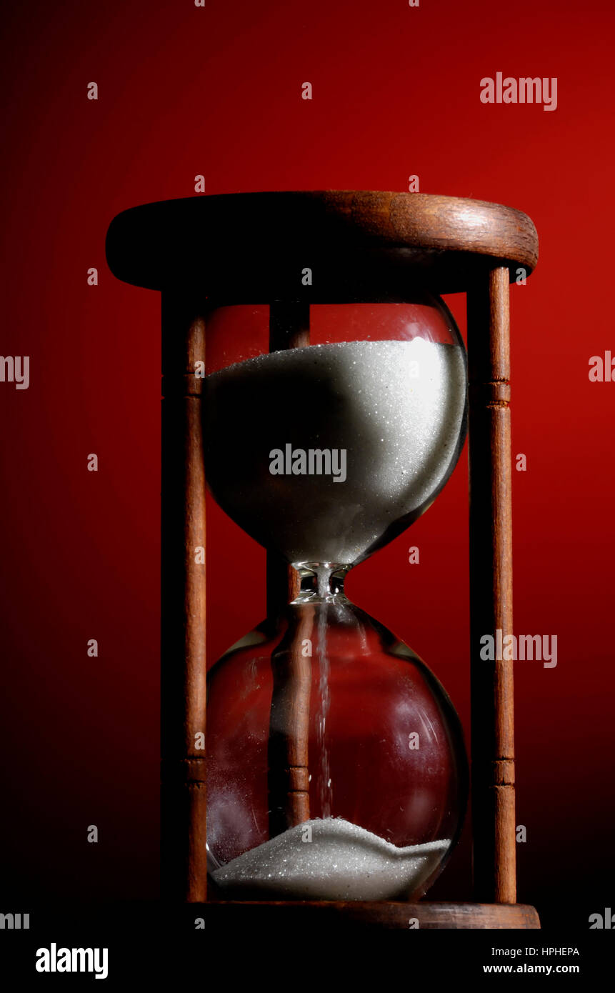 classic wooden hourglass Stock Photo - Alamy