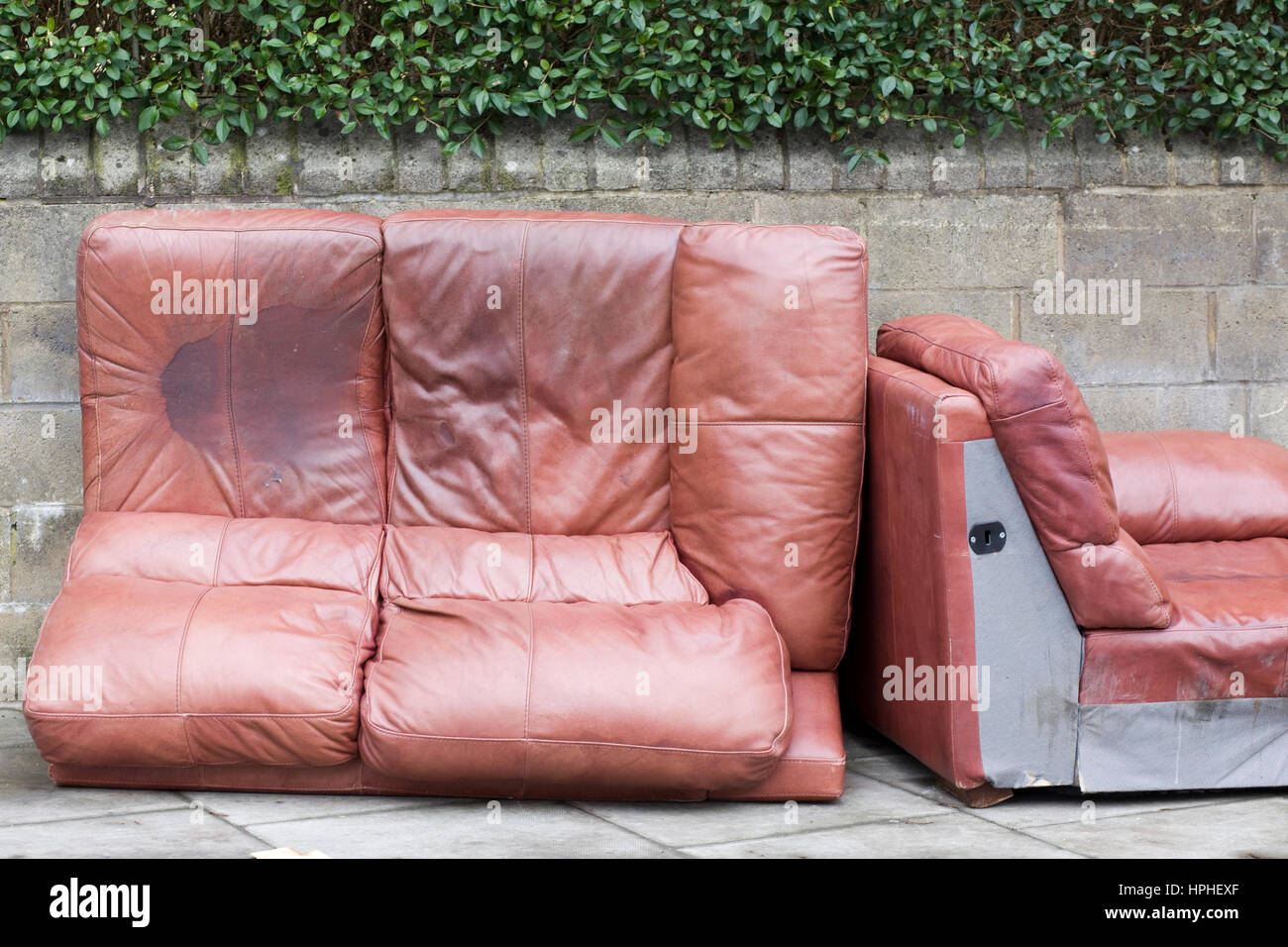 leather sofa dumped on the pavement in London "fly tipping Stock Photo ...