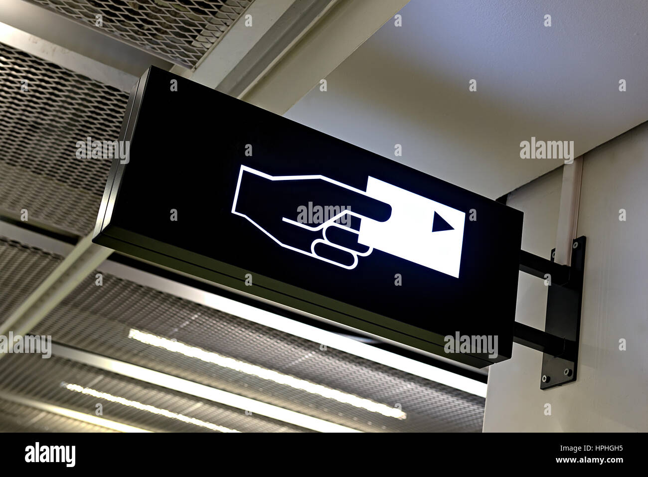 cash machine logo, white hand with a credit card on black Stock Photo ...