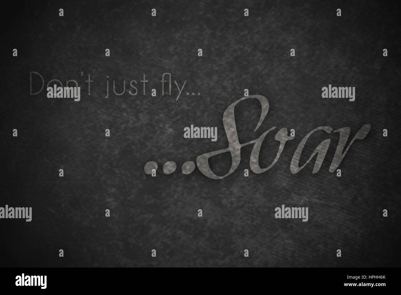 Inspirational quote on a grunge style background Stock Photo - Alamy