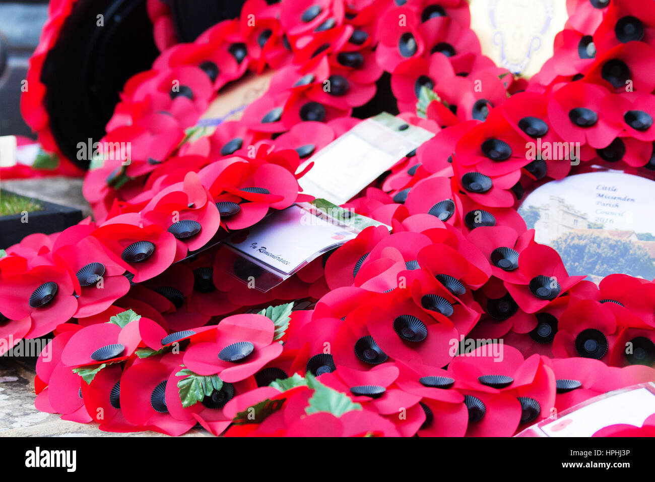 Poppies left at a memorial during a Rememberance Day Service Stock ...
