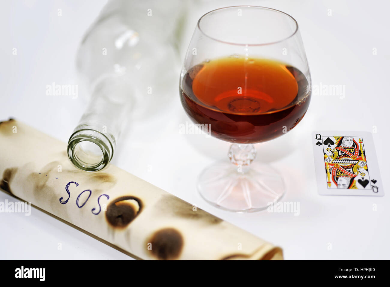 Abstract composition of drinking and playing cards. Isolated on white ...