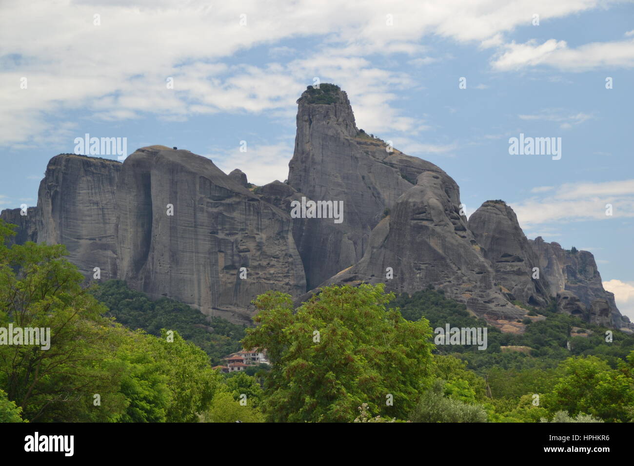 Meteora is formation of immense monolithic pillars and hills-like huge ...