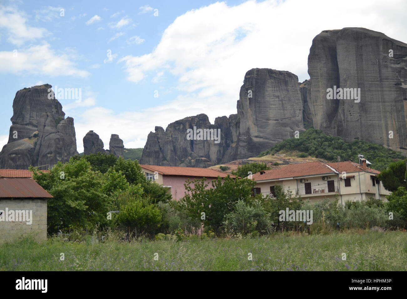 Meteora is formation of immense monolithic pillars and hills-like huge ...