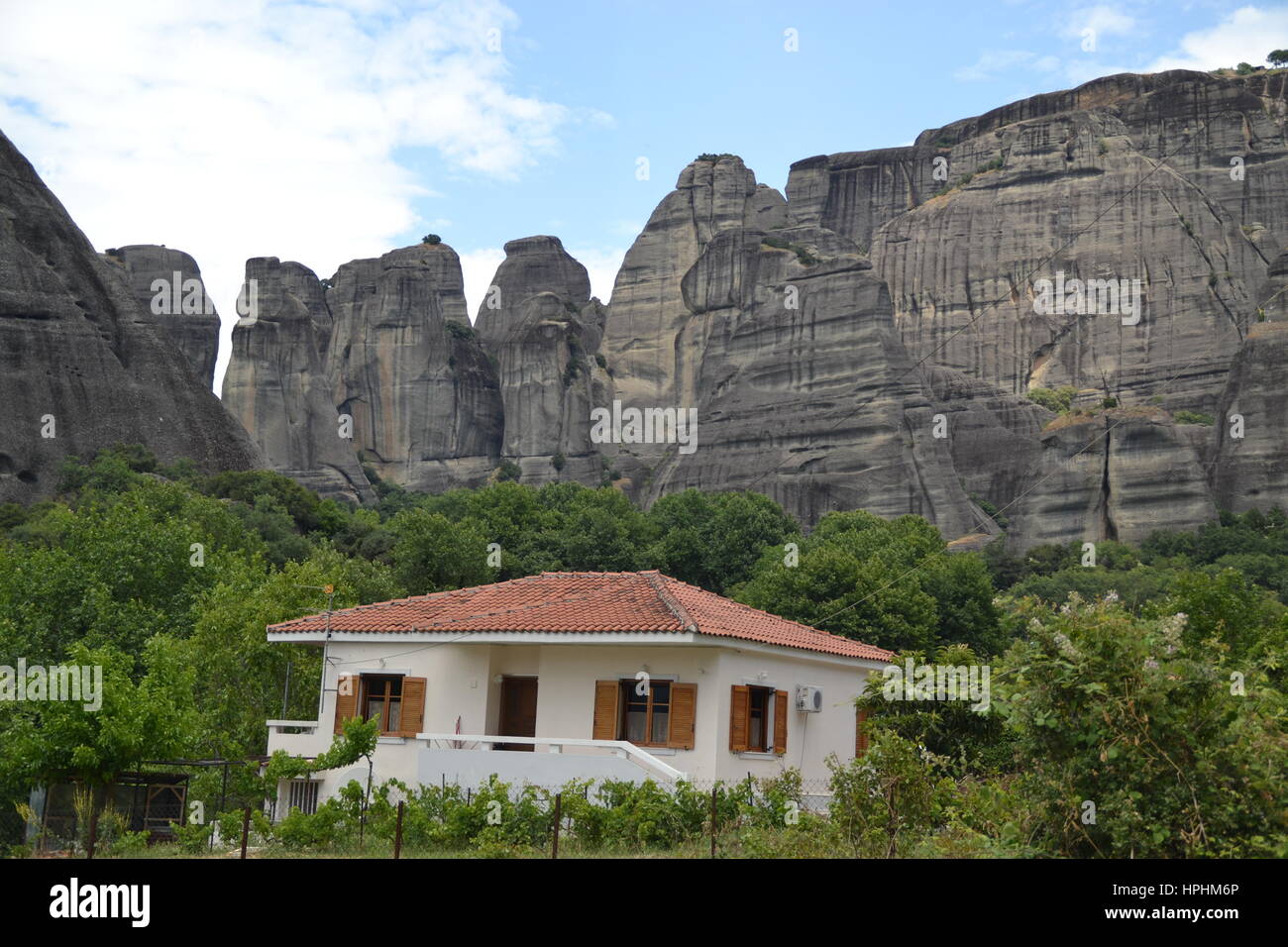Meteora is formation of immense monolithic pillars and hills-like huge ...