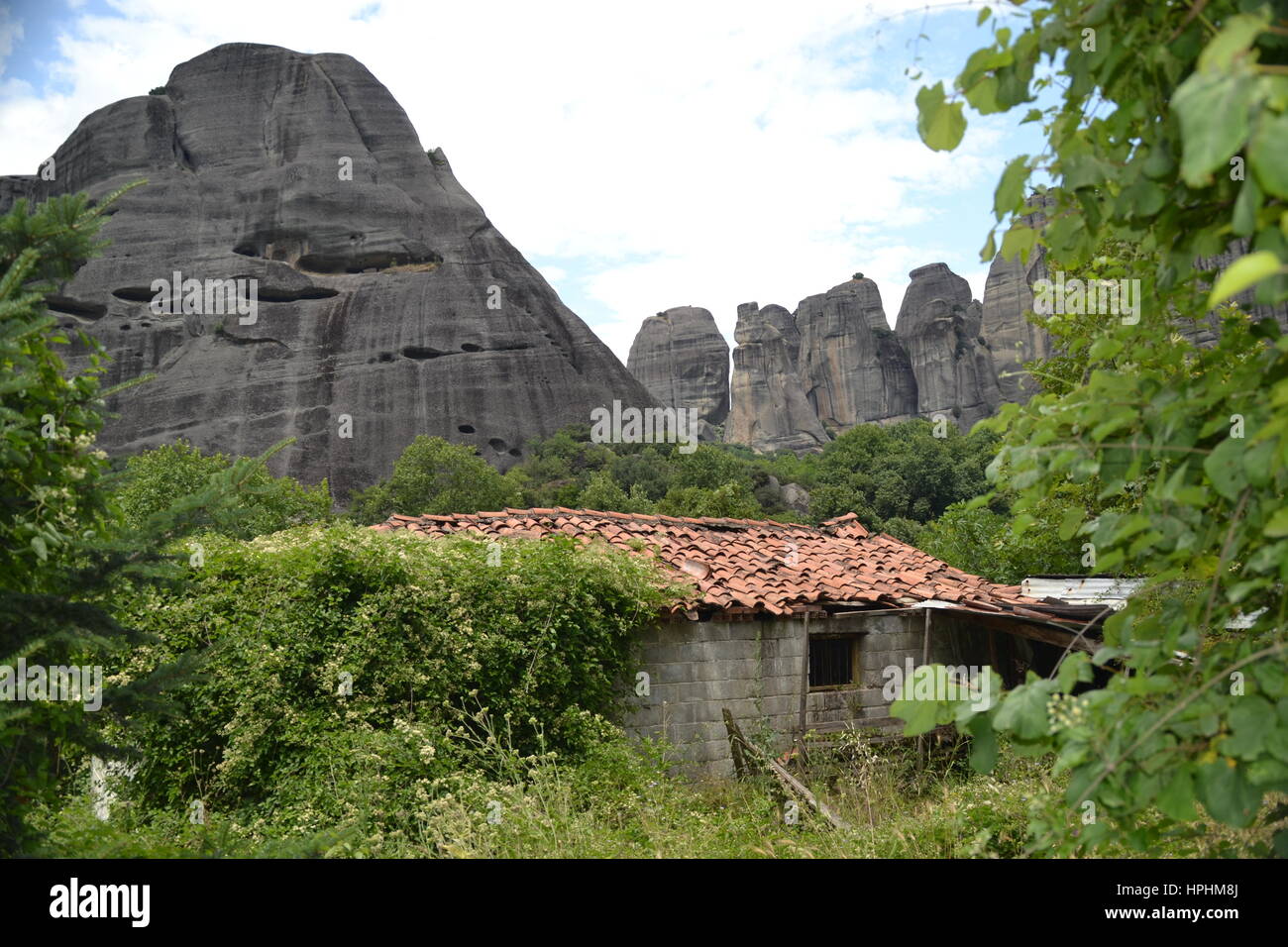 Meteora is formation of immense monolithic pillars and hills-like huge ...