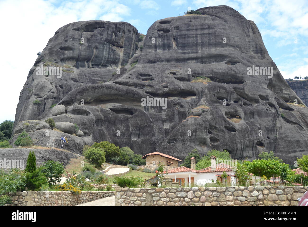 Meteora is formation of immense monolithic pillars and hills-like huge ...
