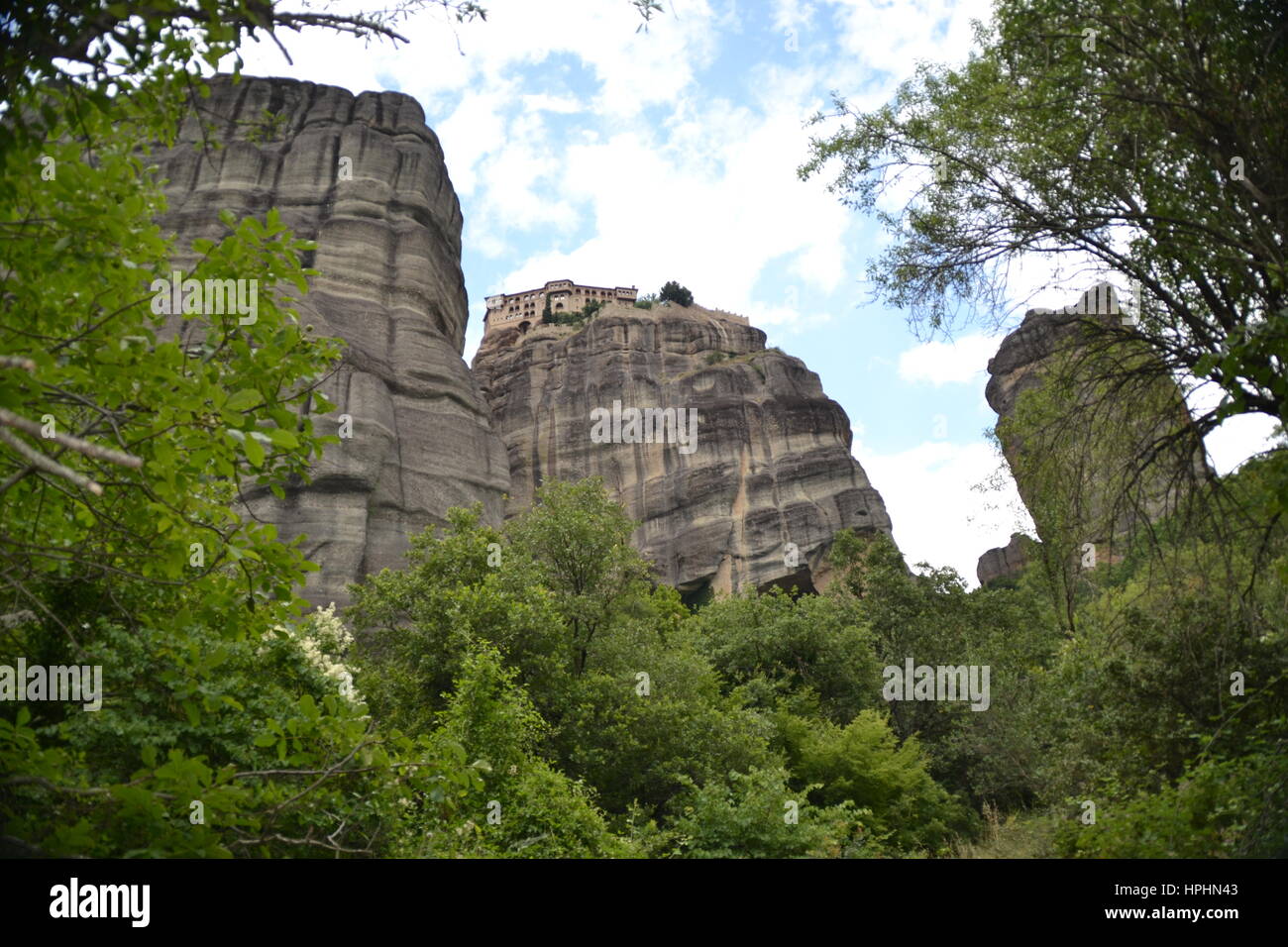 Meteora is formation of immense monolithic pillars and hills-like huge ...