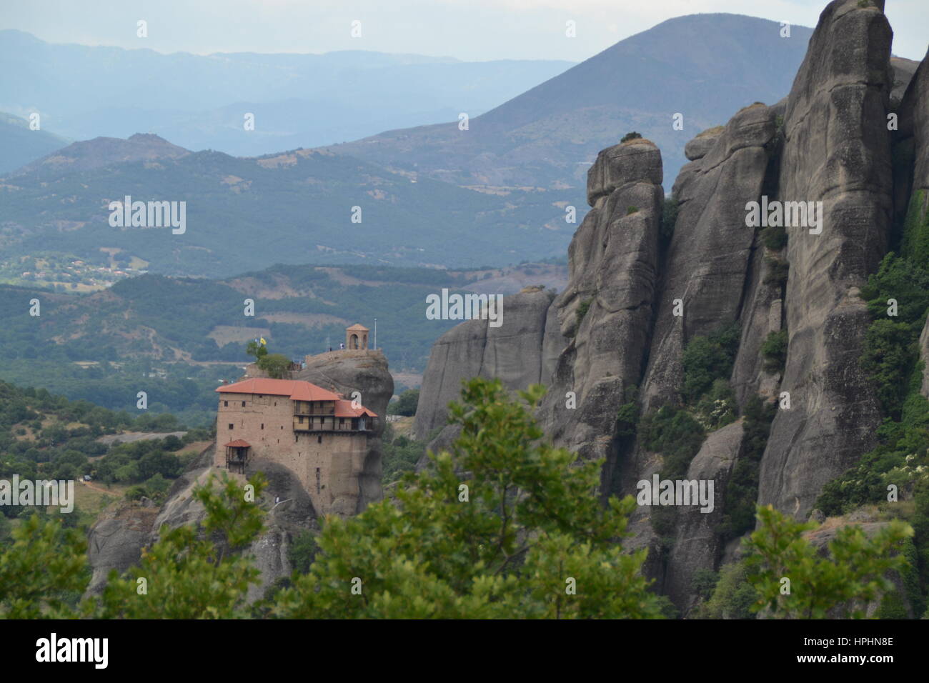 Meteora is formation of immense monolithic pillars and hills-like huge ...