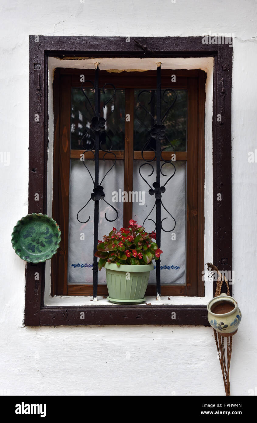 Old brown wooden window frame with hanged pottery Stock Photo - Alamy
