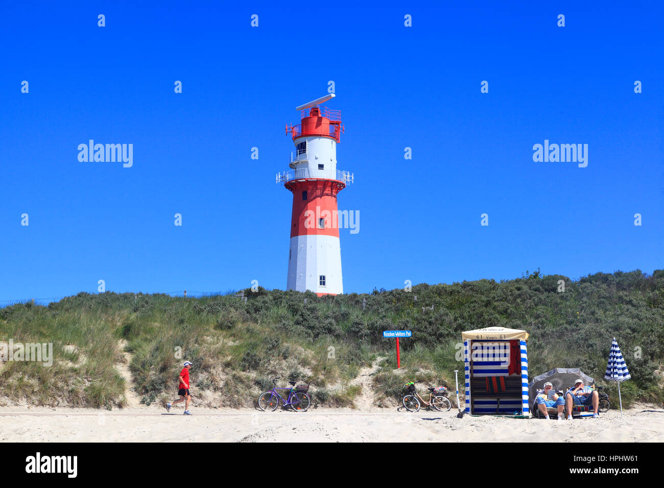 Germany, Lower Saxony. Borkum Island. The beach. The small lighthouse ...