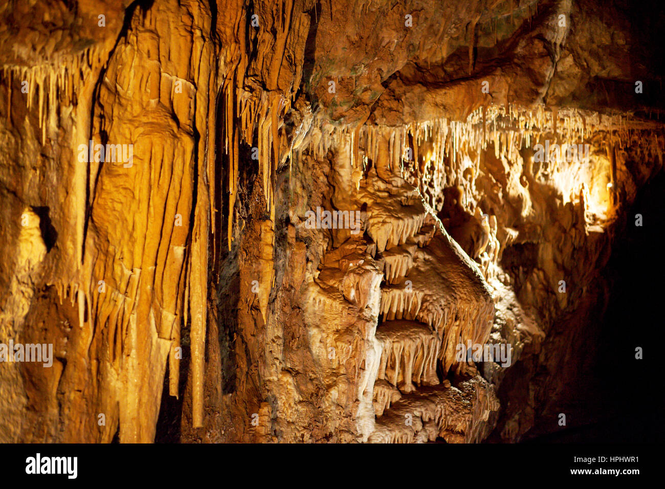 France, Lot, Cave of Lacave, Limestone wall with stalactites Stock ...