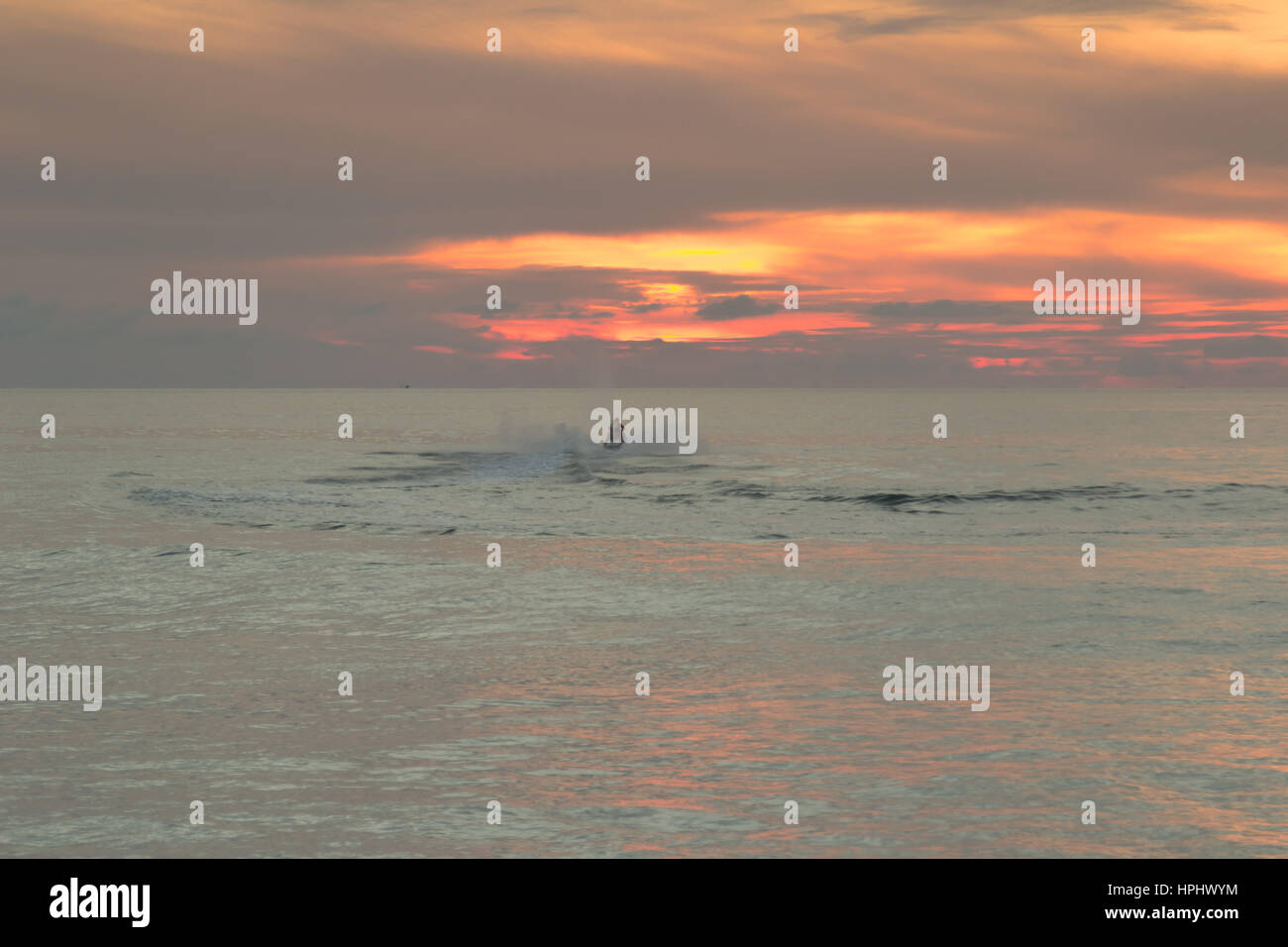 Walking at sunset Stock Photo - Alamy