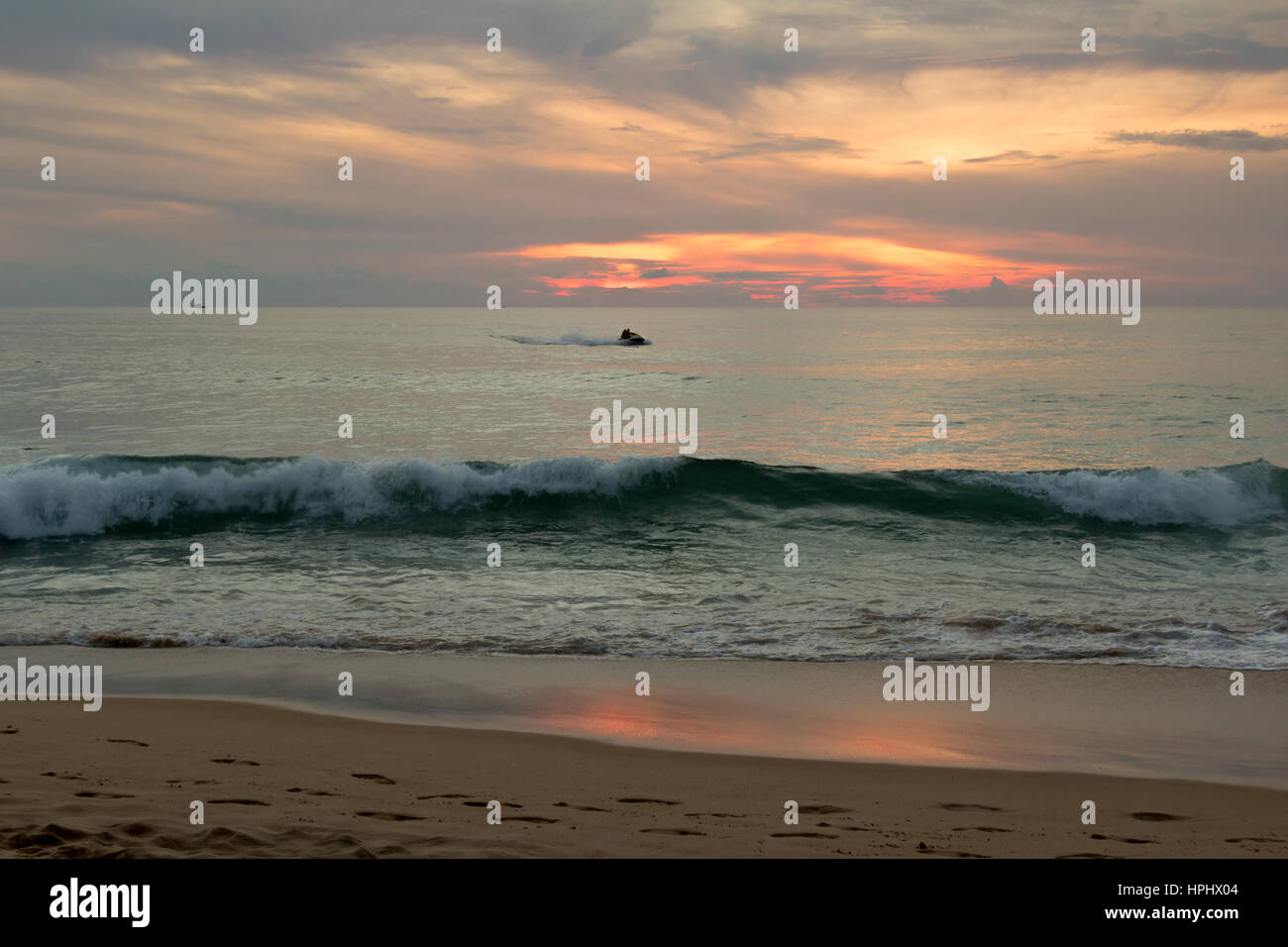 Walking at sunset Stock Photo - Alamy