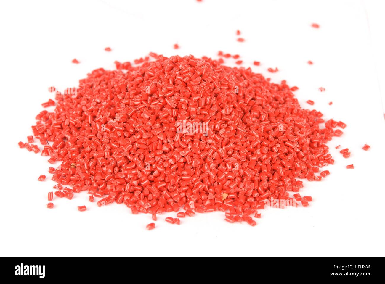 Red Plastic granules Stock Photo - Alamy
