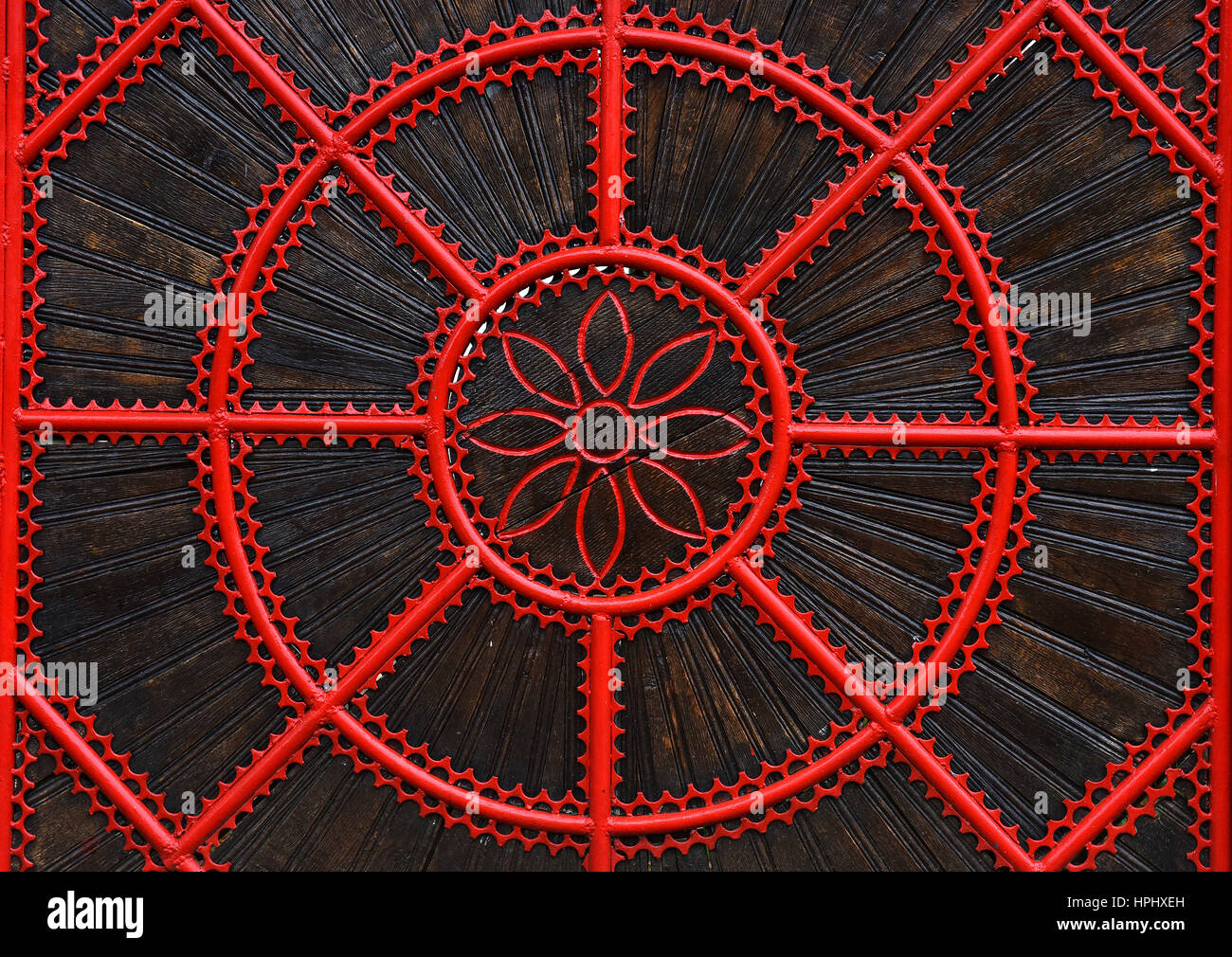 Detail of a red forged metallic gate. Forged decorative fence Stock ...