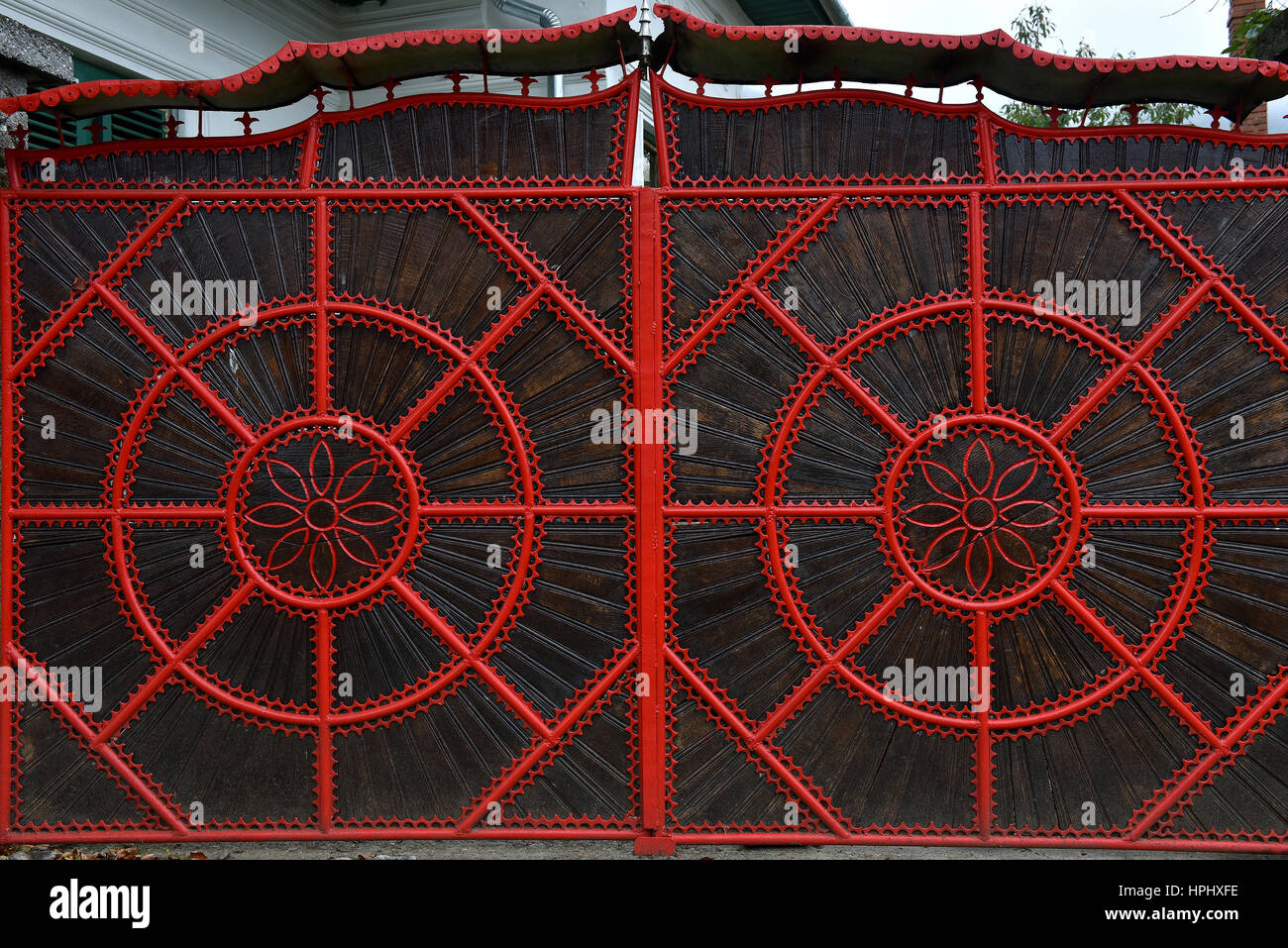 Detail of a red forged metallic gate. Forged decorative fence Stock ...