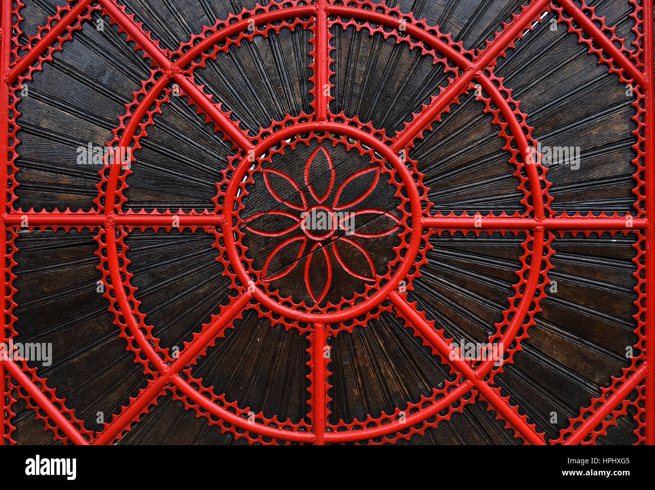 Detail of a red forged metallic gate. Forged decorative fence Stock ...