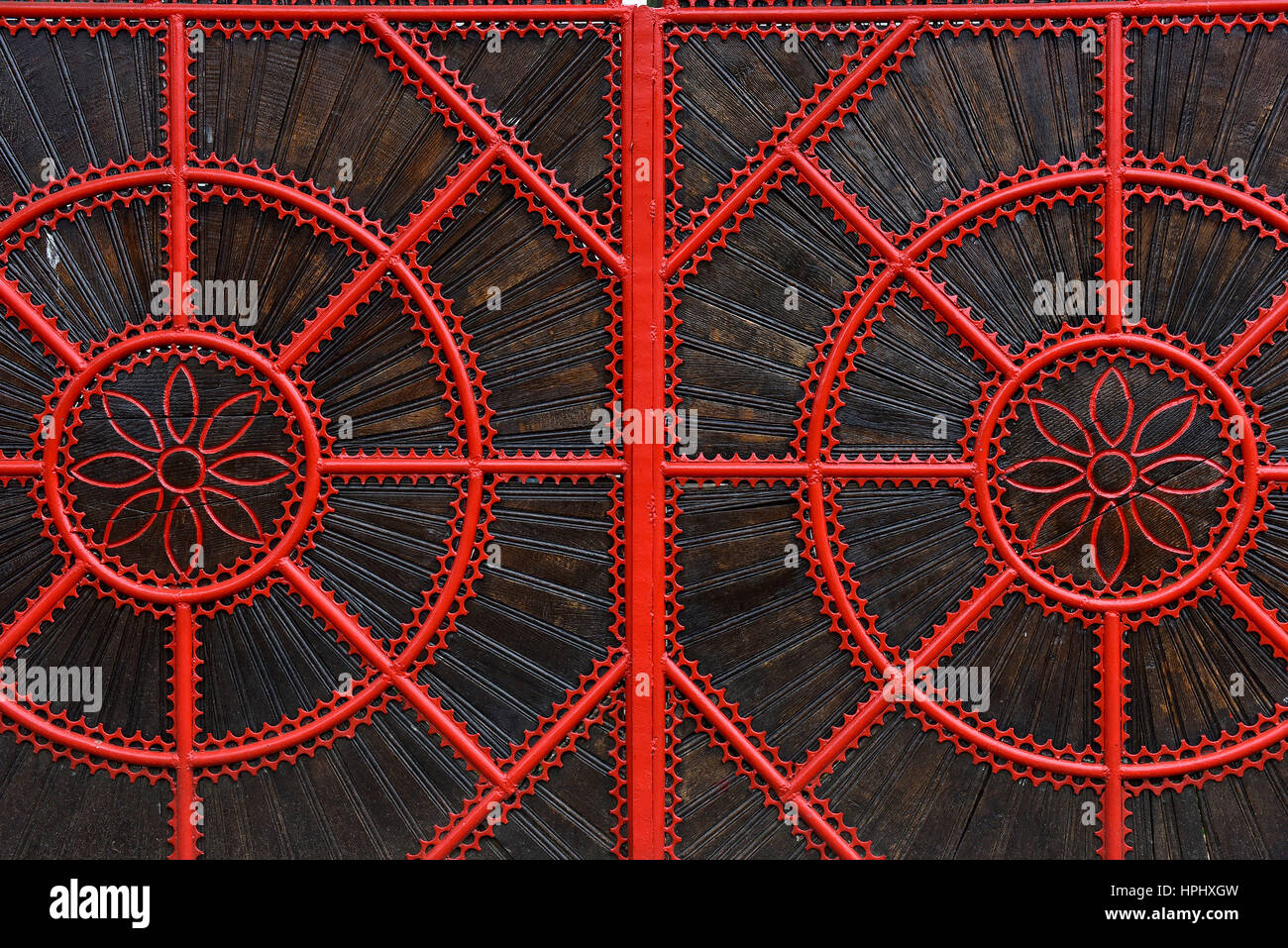 Detail of a red forged metallic gate. Forged decorative fence Stock ...