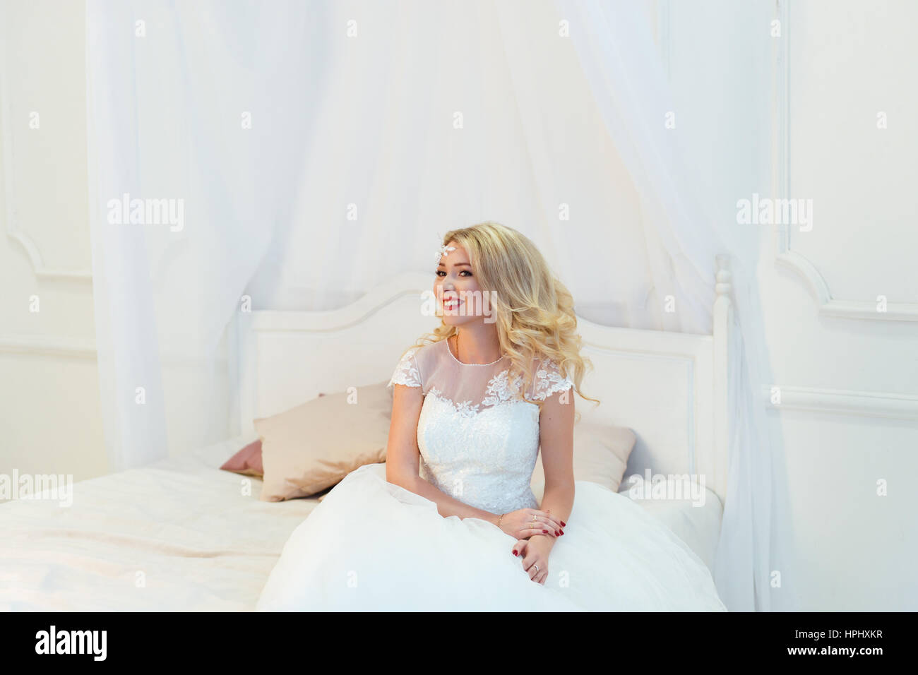 Wedding dress and bra on bed hi-res stock photography and images - Alamy
