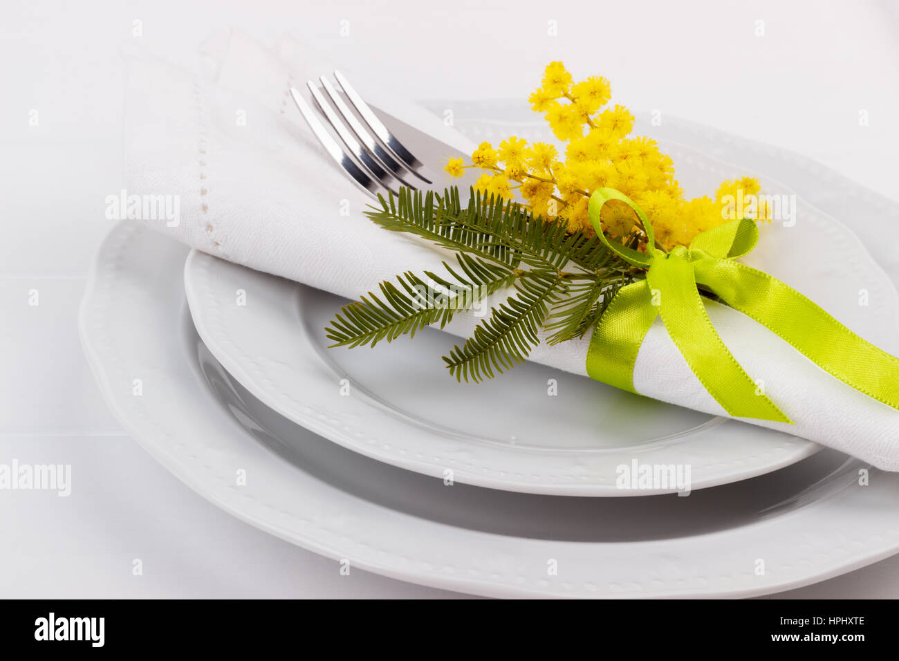 Spring table setting with mimosa. Holidays background with copy space ...