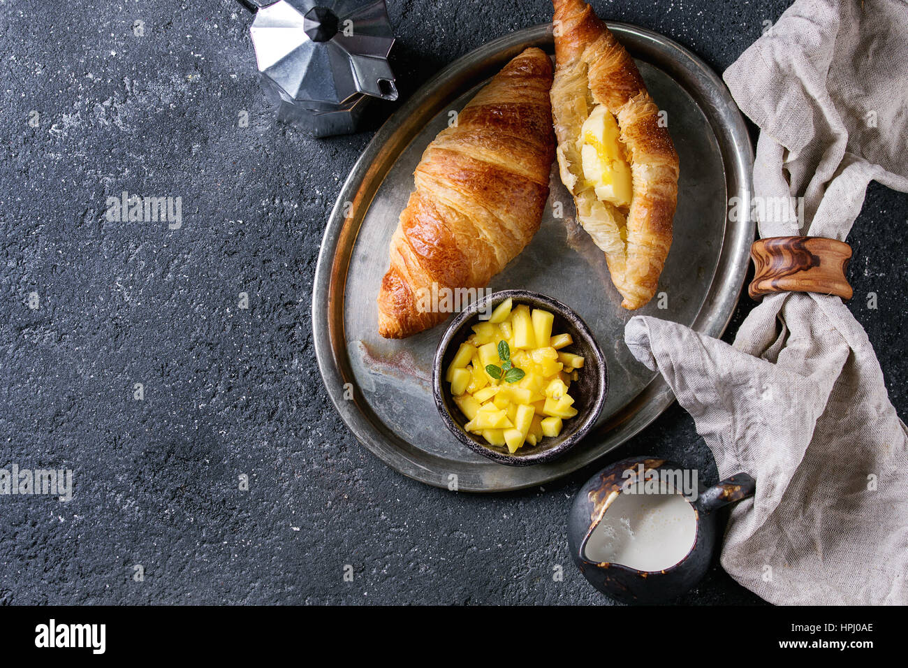 Breakfast with croissant and mango fruit Stock Photo - Alamy