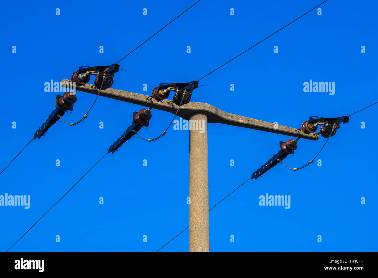 Industrial power line pylon close up Stock Photo - Alamy