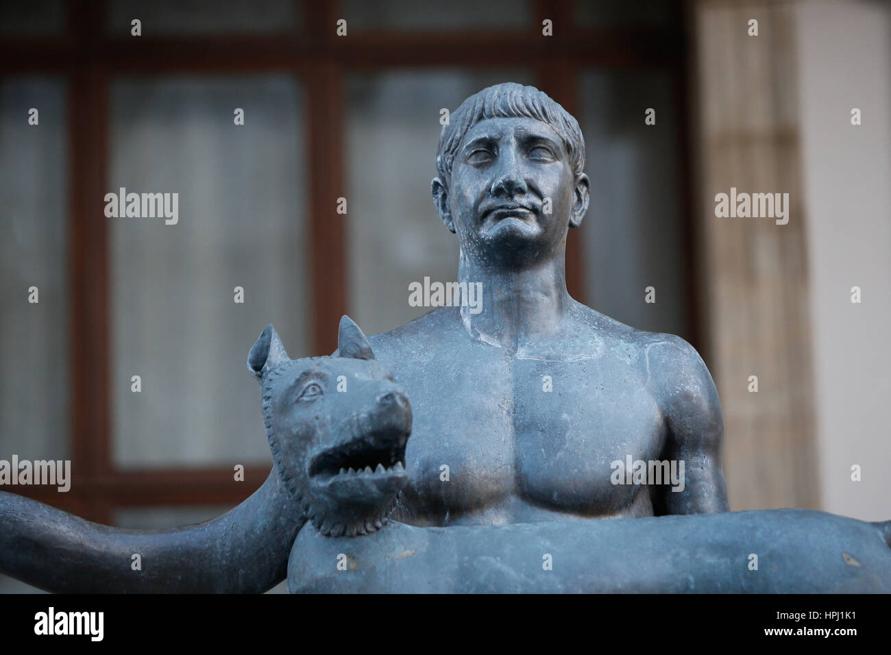 A statue representing Roman emperor Trajan holding a wolf and a snake ...