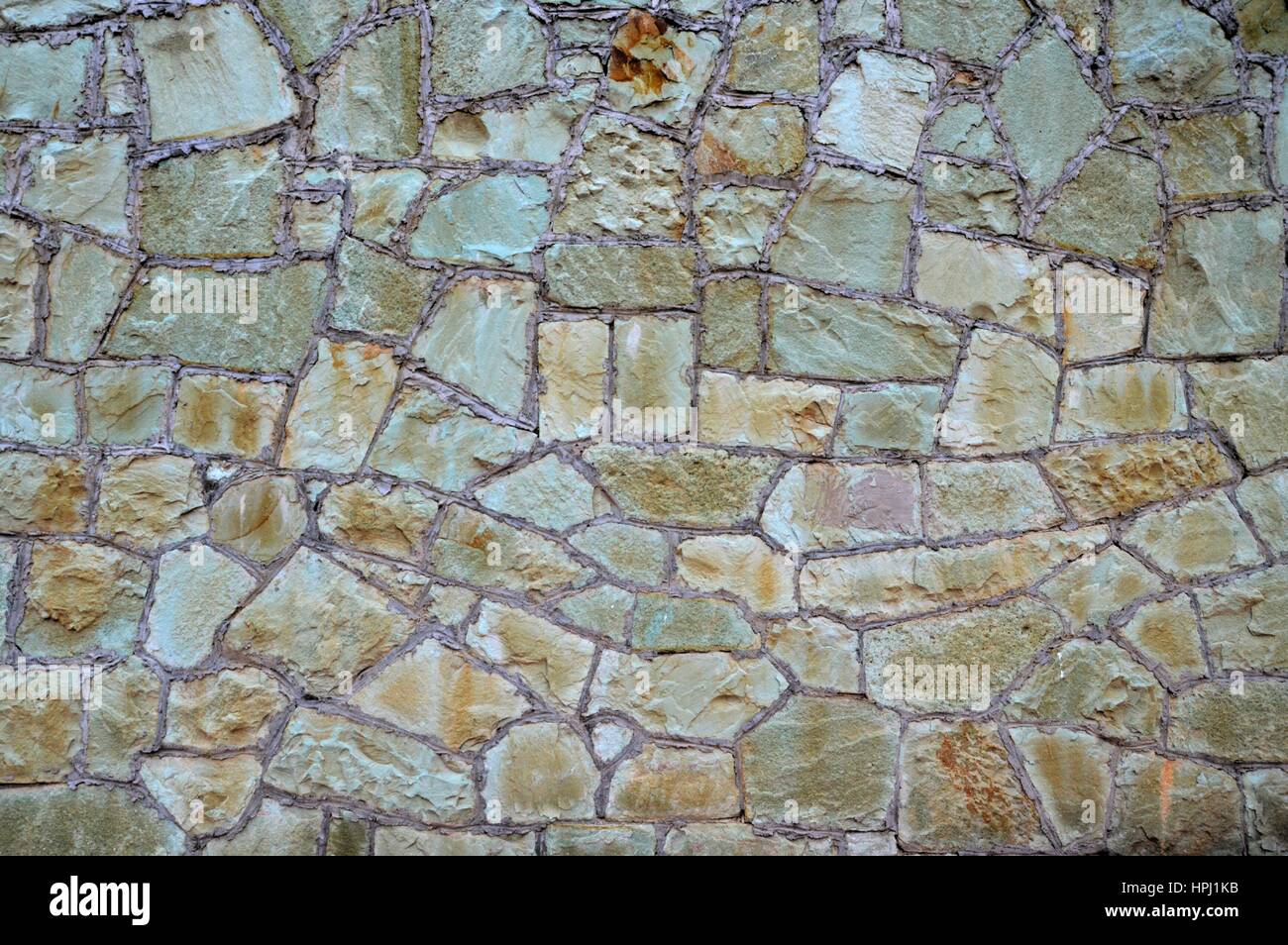 rusty colorful old stone wall Stock Photo - Alamy