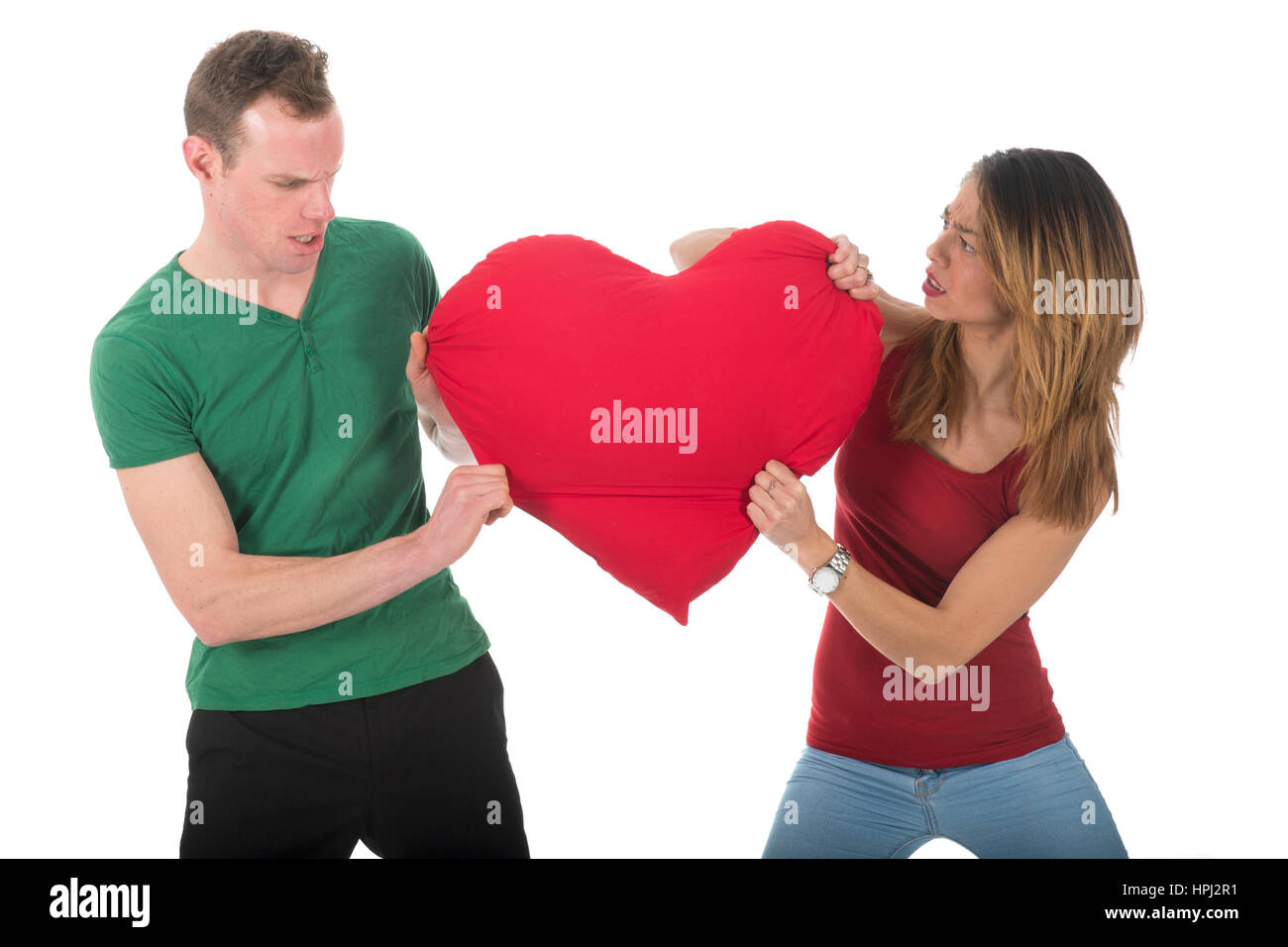 Young couple fighting for the heart of love Stock Photo - Alamy