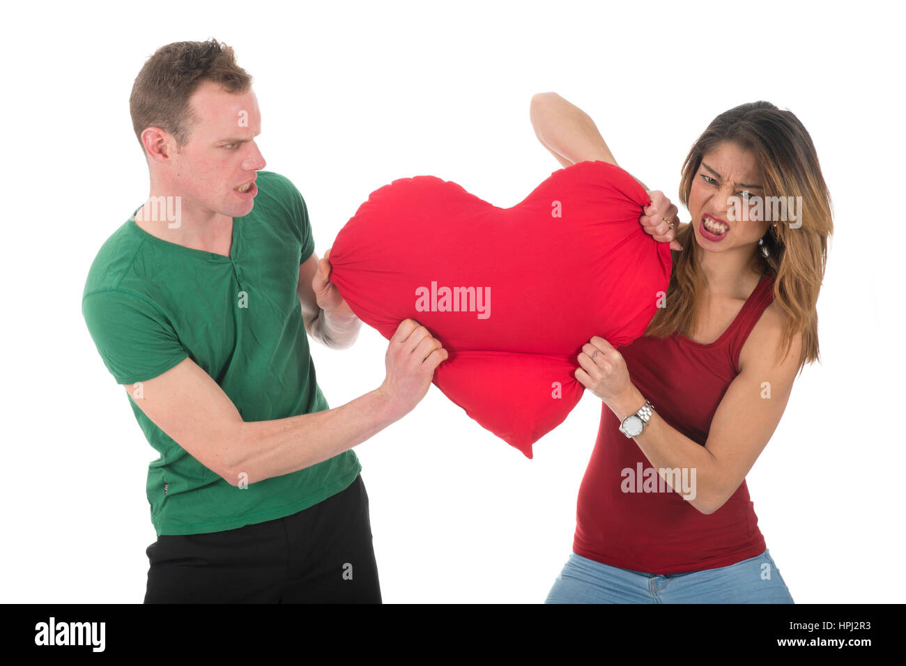 Young couple fighting for the heart of love Stock Photo - Alamy