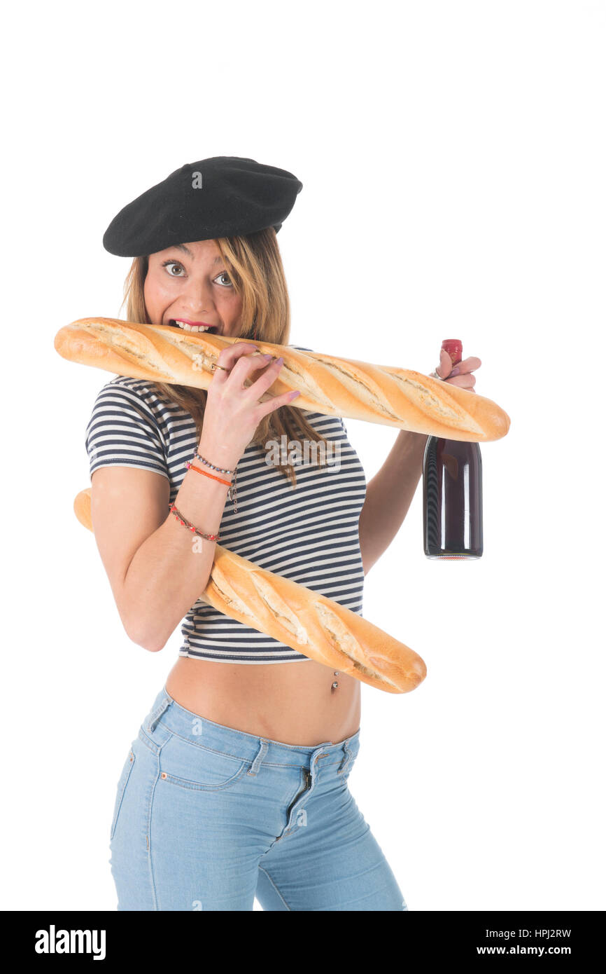 Young French girl with typical French barret and striped shirt eating ...