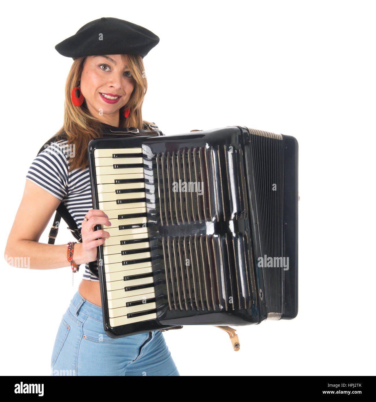 French girl making music with accordion instrument isolated over white ...