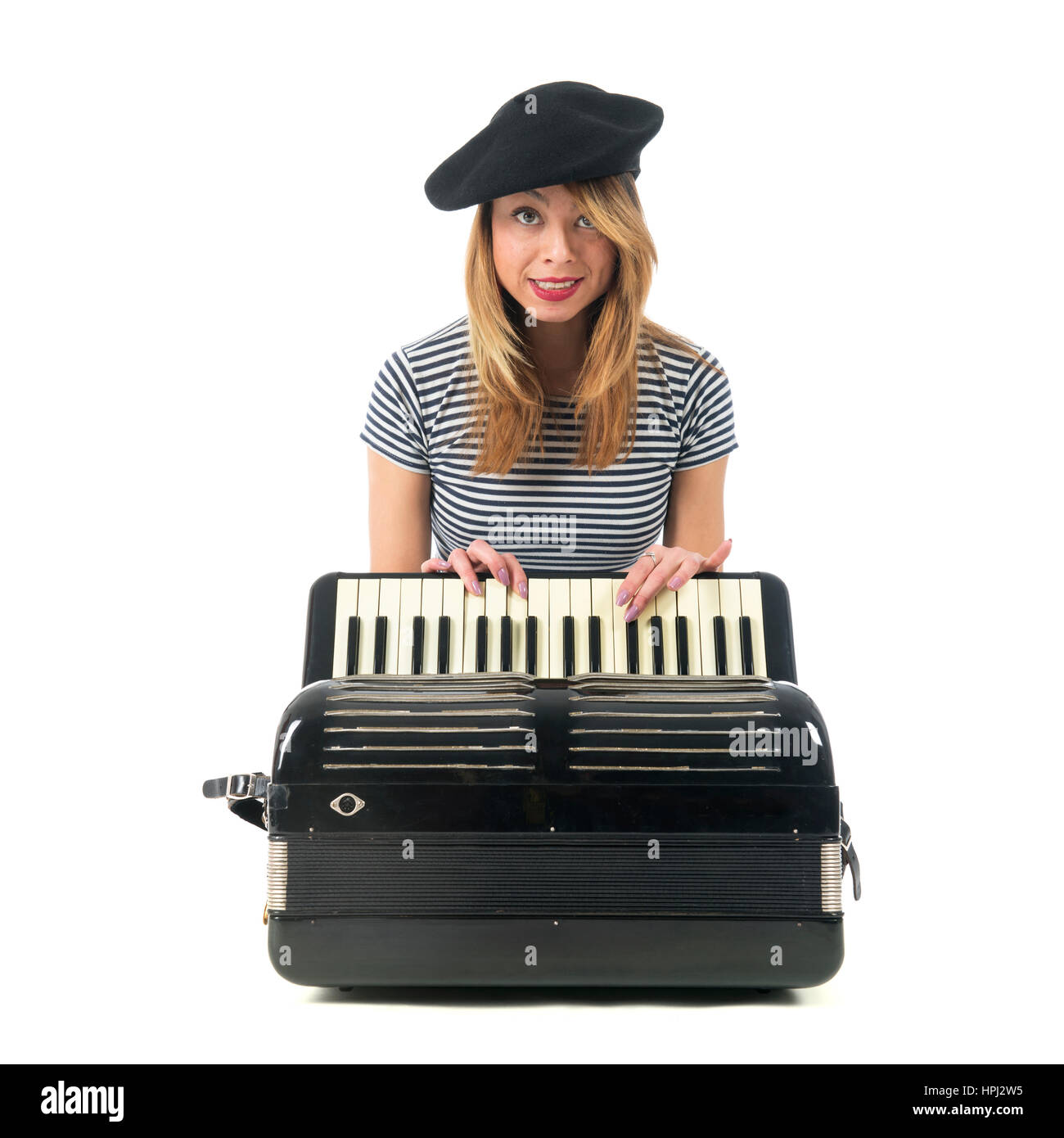 French girl making music with accordion instrument isolated over white ...