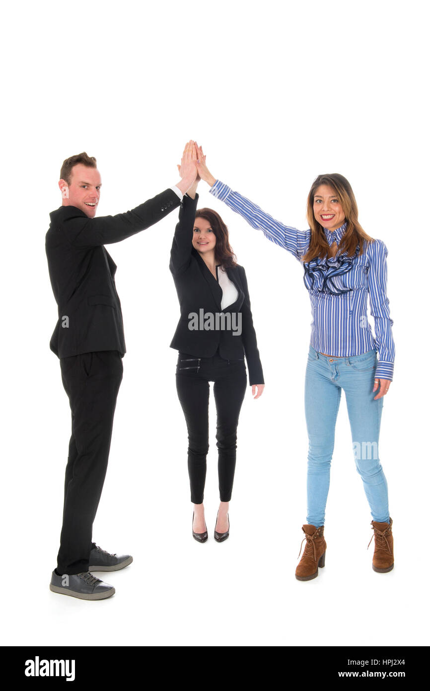 Three employees making high five for the business isolated over white ...