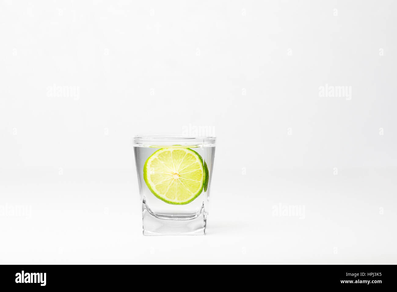 Lime in glass, lime fresh isolated on white background Stock Photo - Alamy