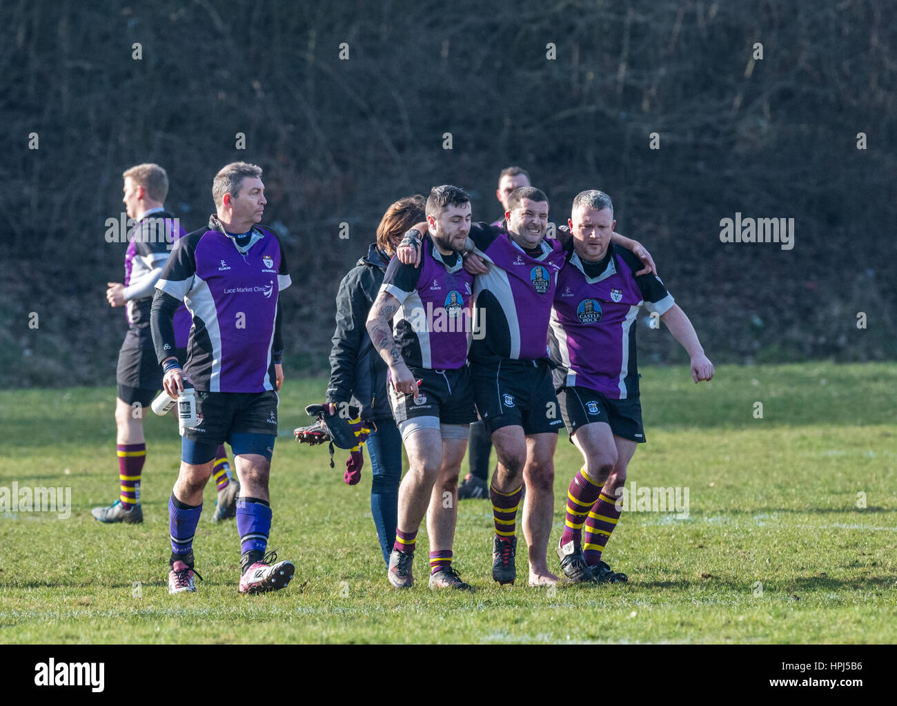 Male rugby union football player being held off the field Stock Photo ...