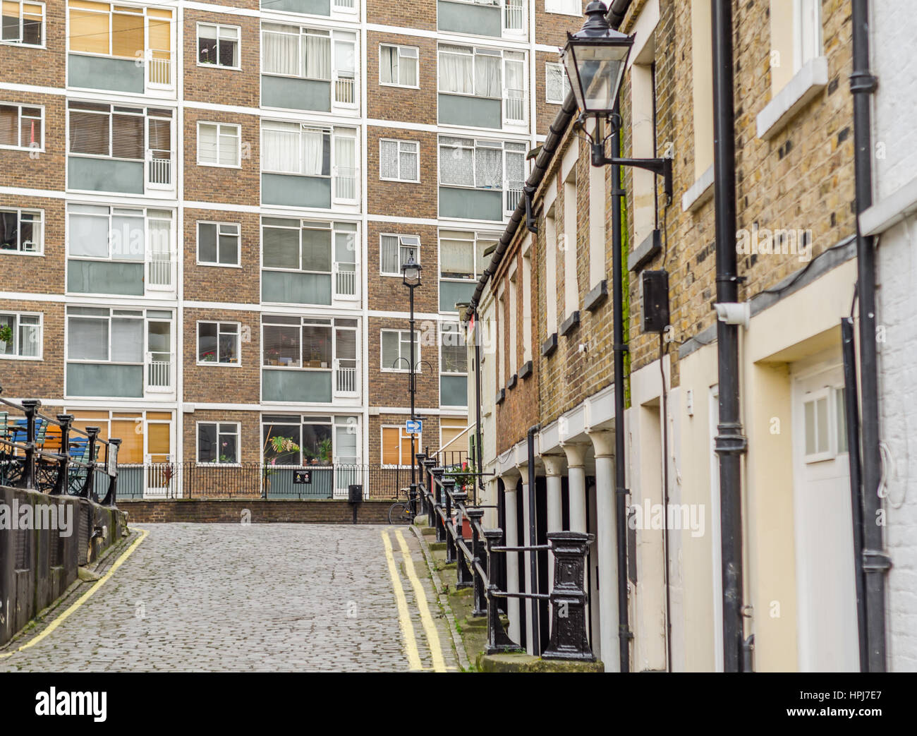 narrow passage to the streets with buildings low-rise buildings ...