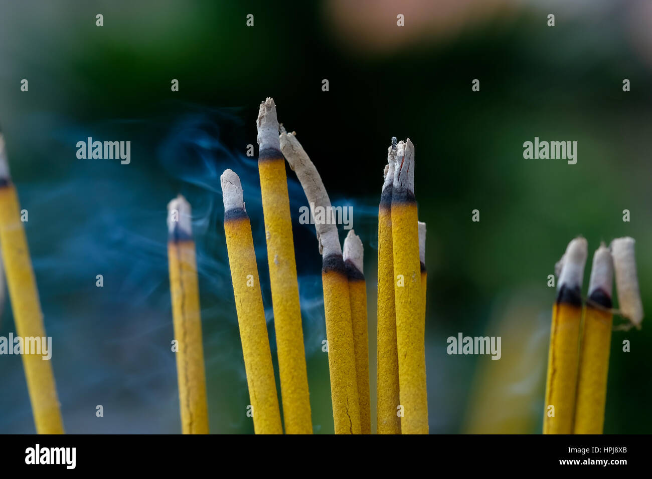 Many incense sticks burning smoke hi-res stock photography and images ...