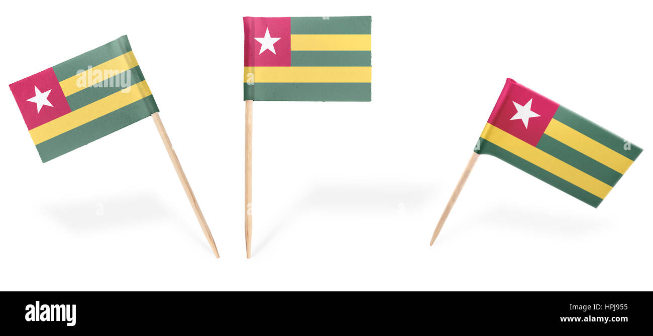 Small cocktail flags of Togo in different positions isolated on white ...