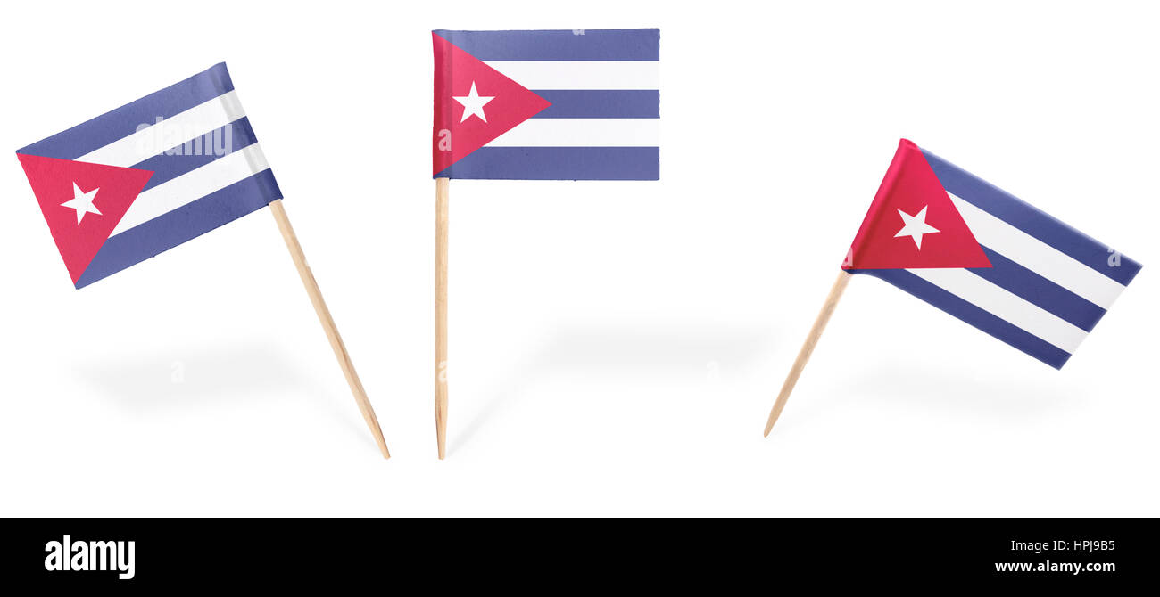 Small cocktail flags of Cuba in different positions isolated on white ...
