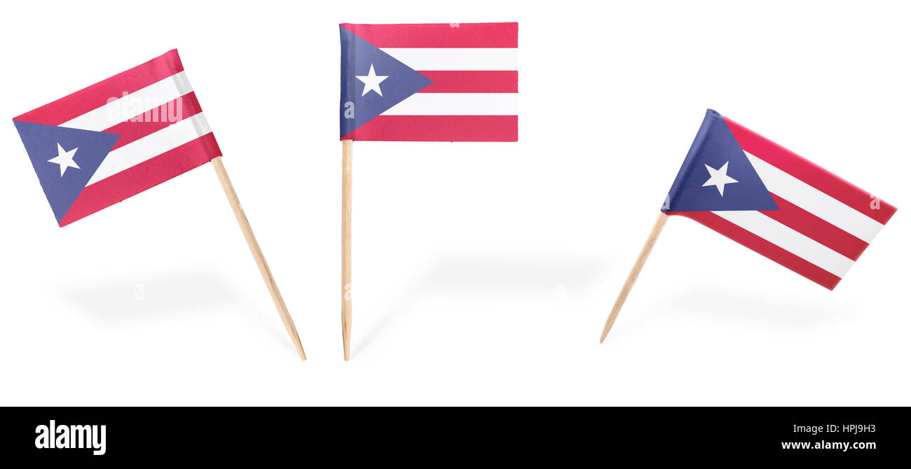 Small cocktail flags of Puerto Rico in different positions isolated on ...