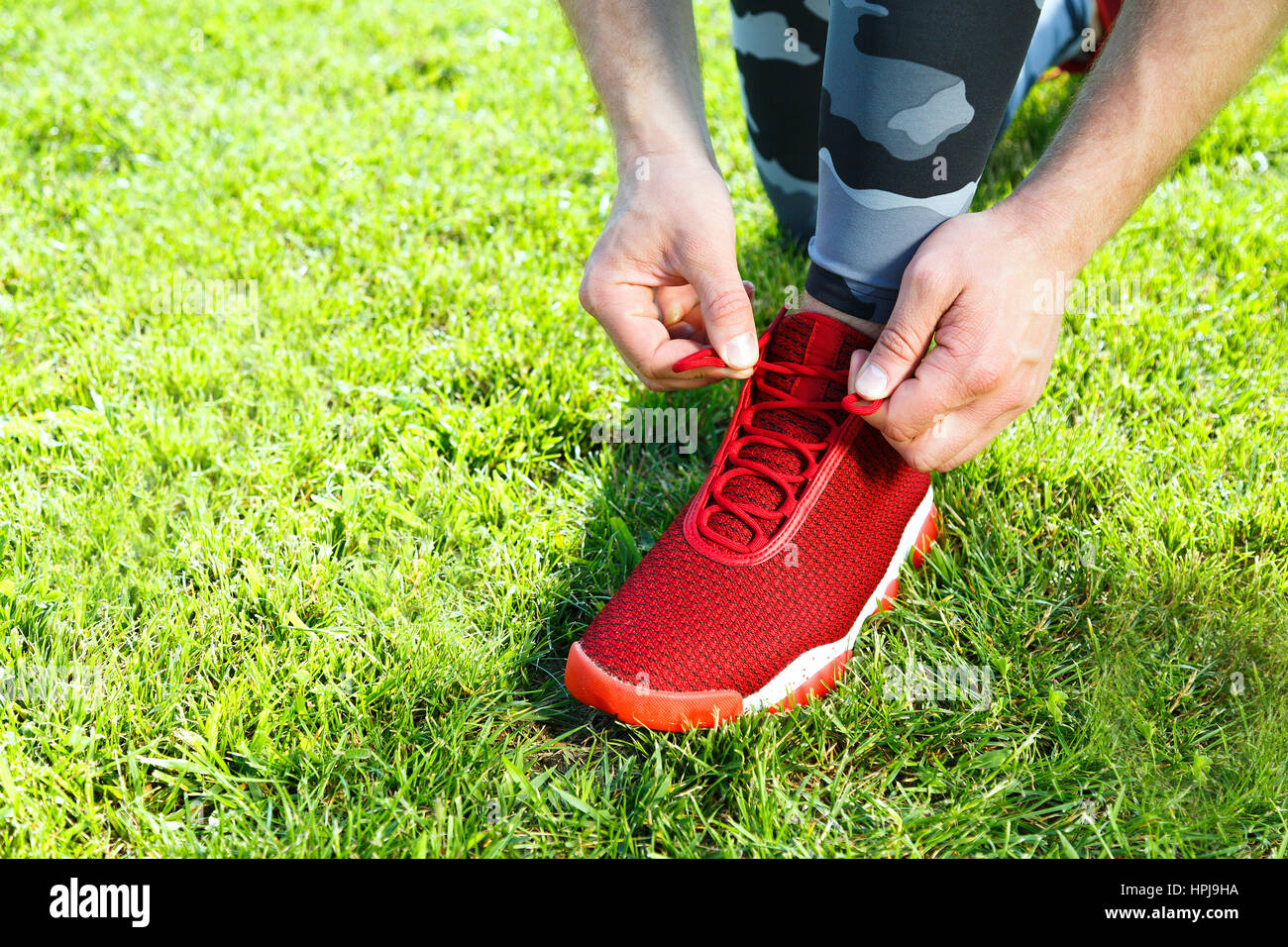 Running sneaker action hi-res stock photography and images - Alamy
