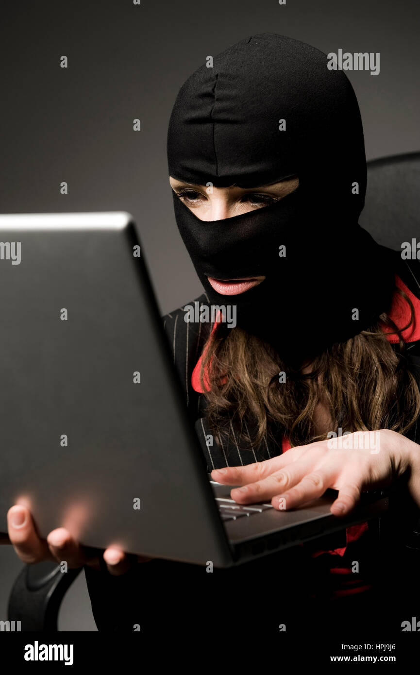Woman secret agent laptop hi-res stock photography and images - Alamy