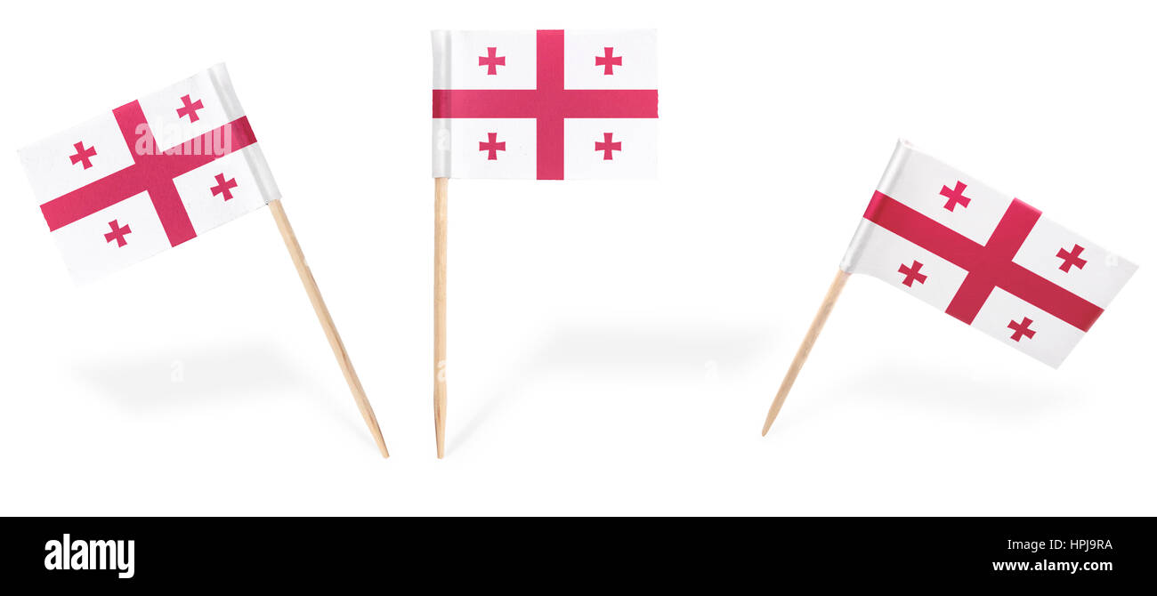 Small cocktail flags of Georgia in different positions isolated on ...