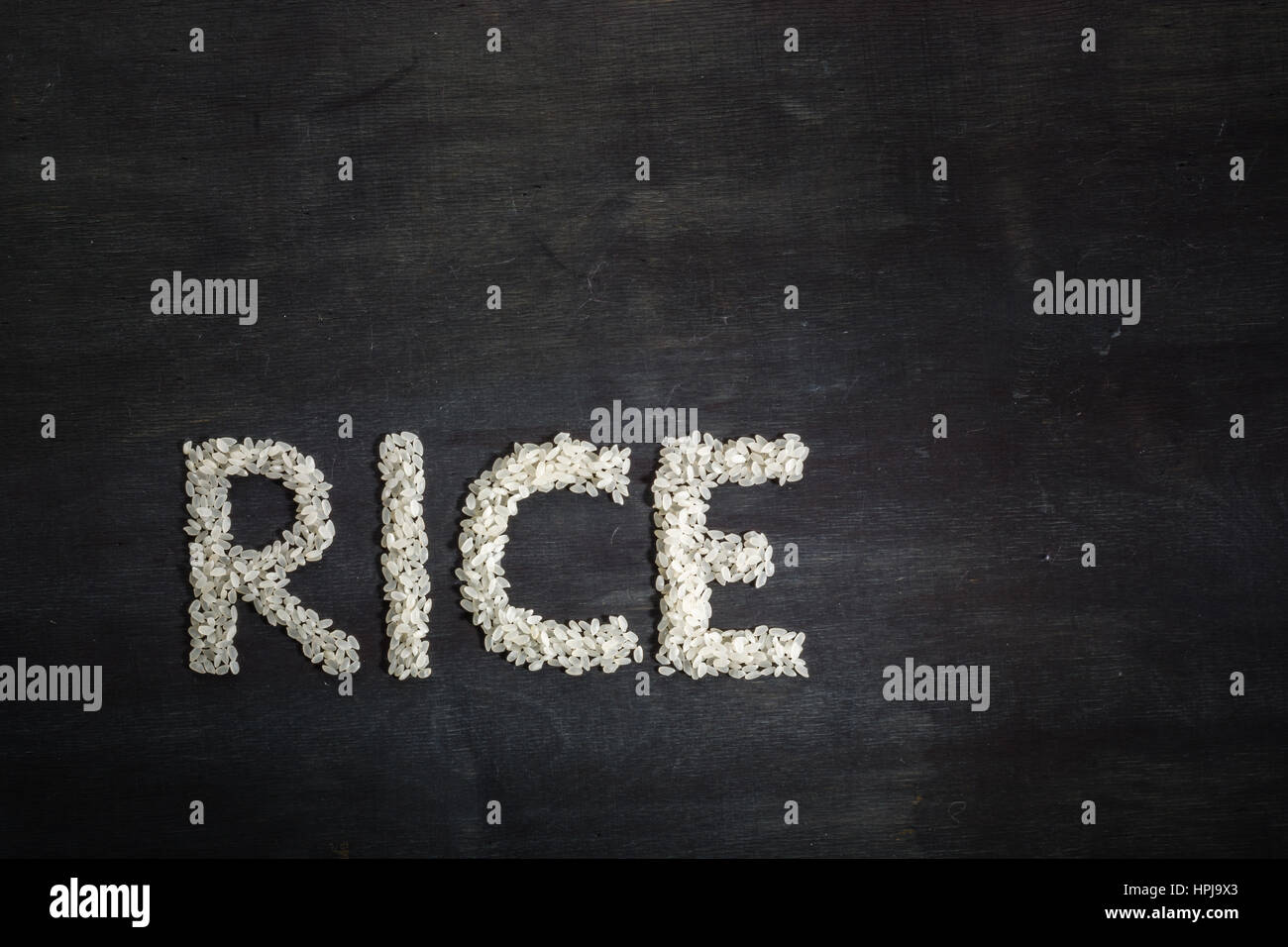 Rice in the form of words. View from above. Space for text Stock Photo ...