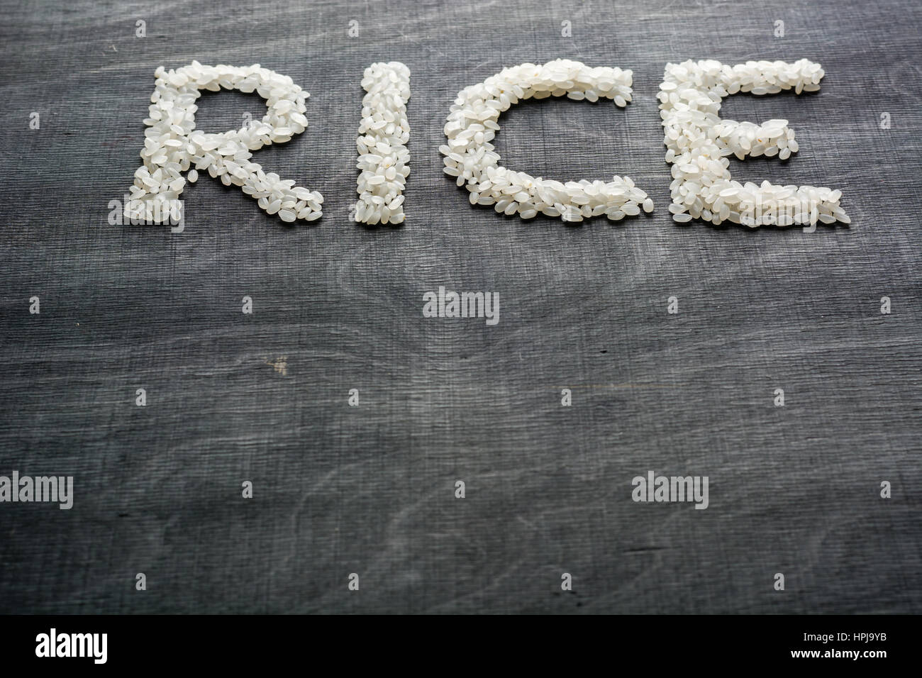 Rice in the form of words. View from above. Space for text Stock Photo ...