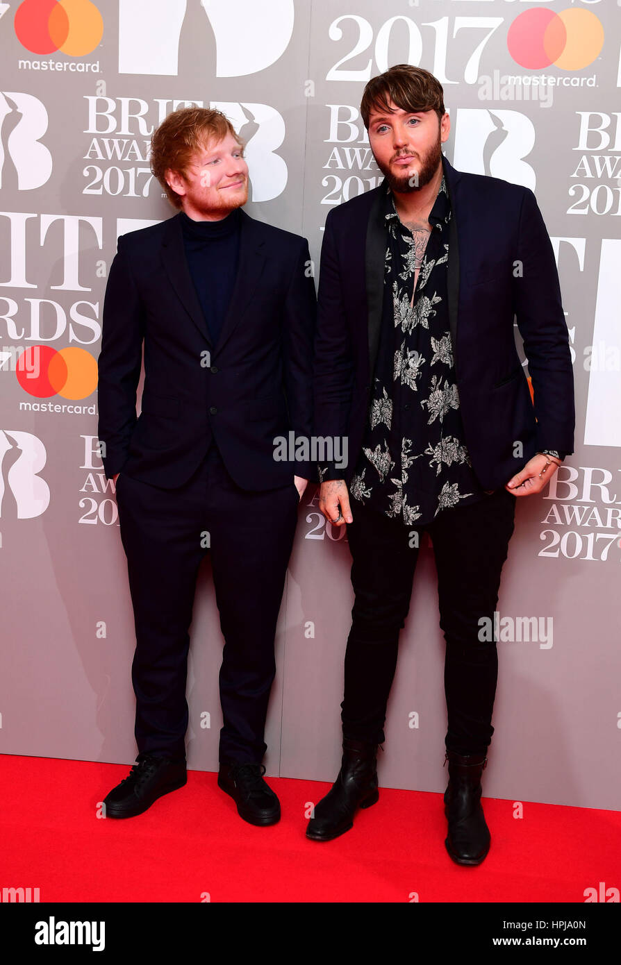 Ed Sheeran and James Arthur (right) attending the Brit Awards at the O2 ...