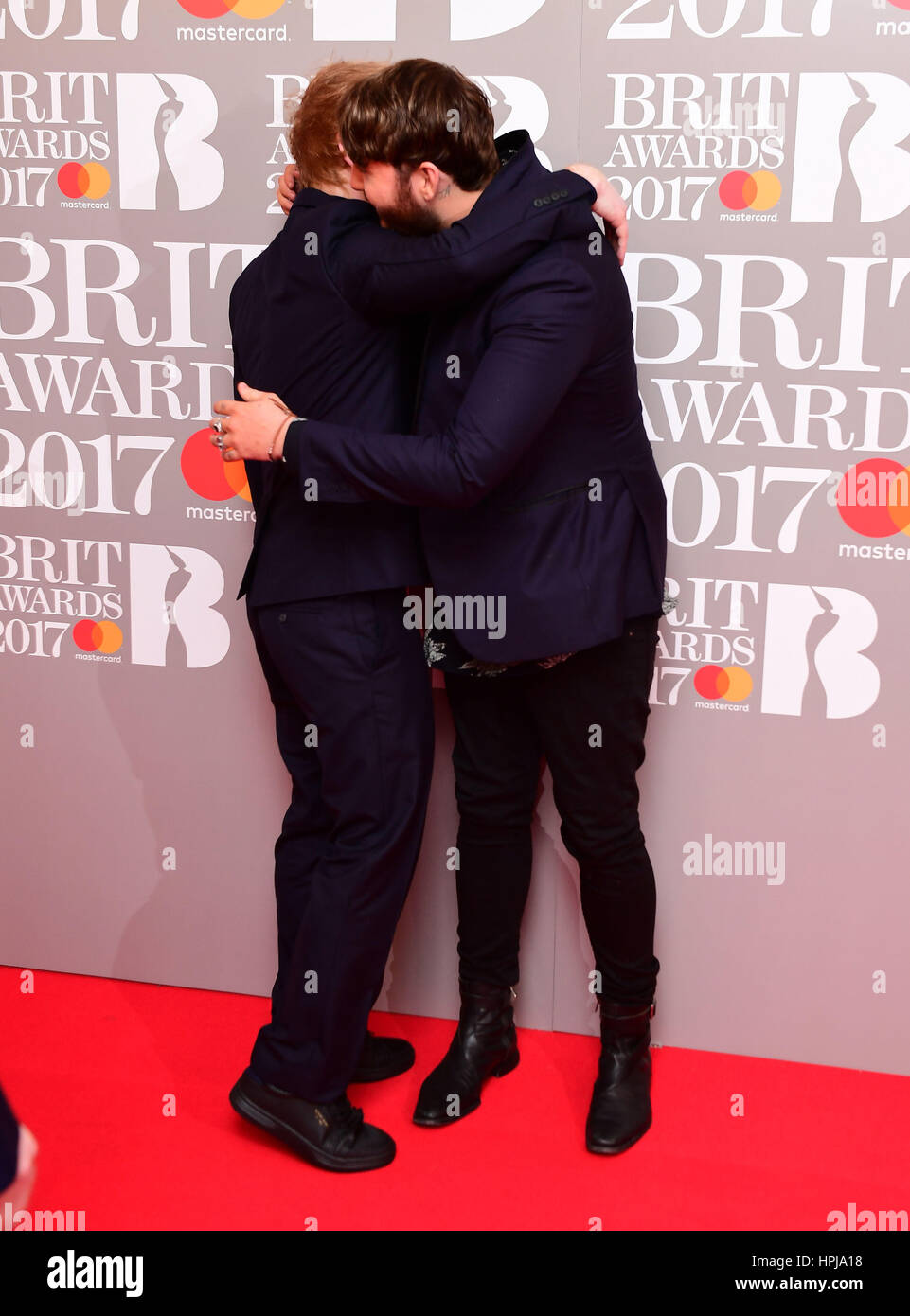 Ed Sheeran and James Arthur (right) attending the Brit Awards at the O2 ...